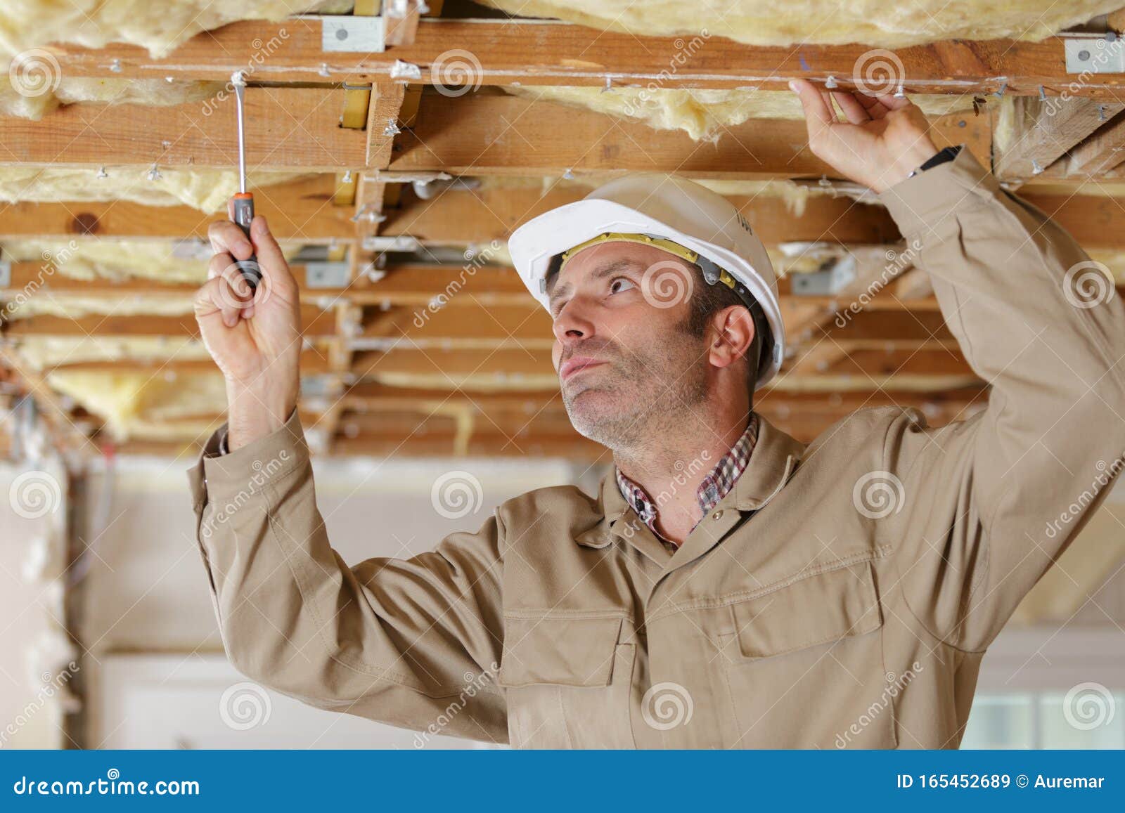 Man fixing ceiling stock image. Image of interior, lamp - 165452689