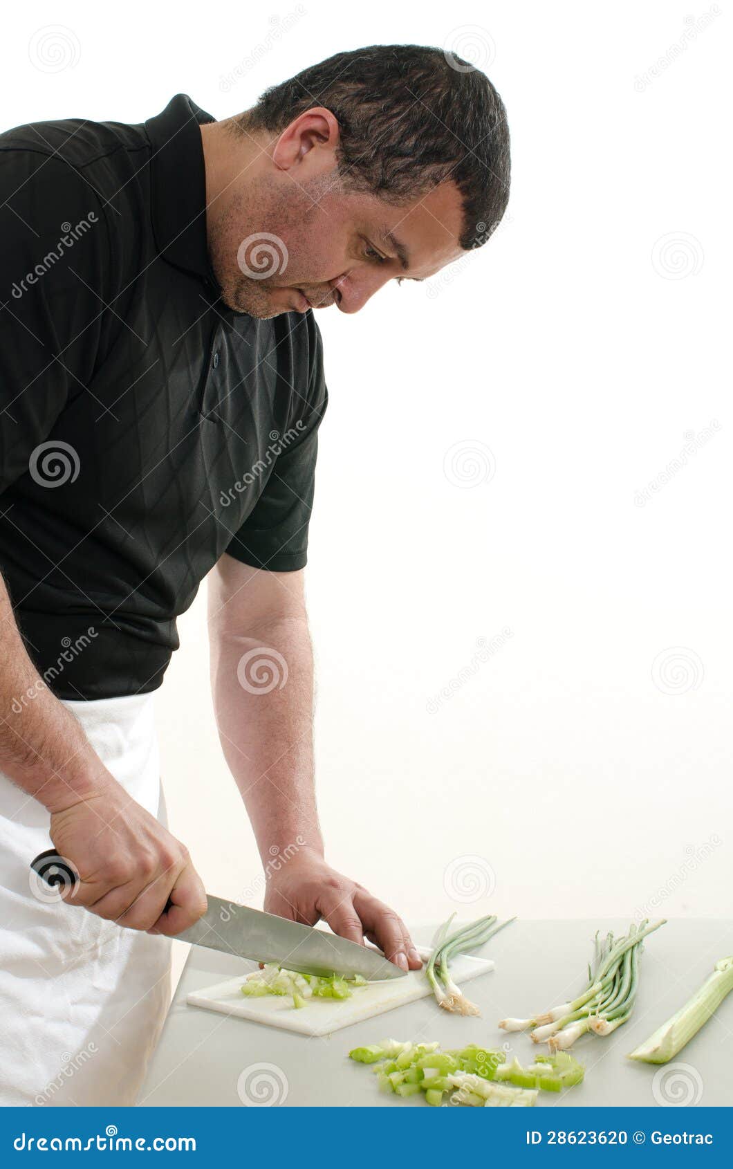 Man fixing dinner stock photo. Image of male, forties - 28623620