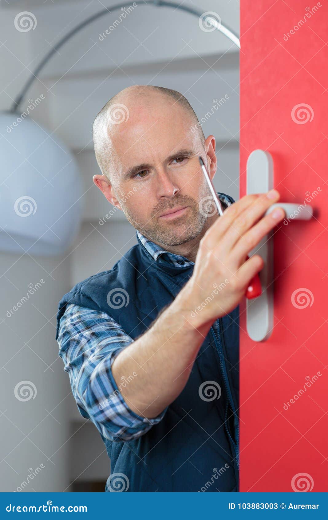 Man Fixing Door with Screwdriver Stock Image - Image of renovation ...