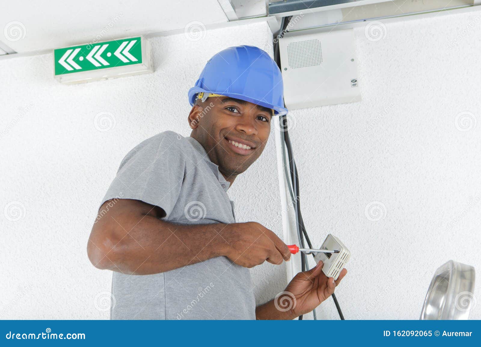 Man fixing electrical wire stock image. Image of install - 162092065
