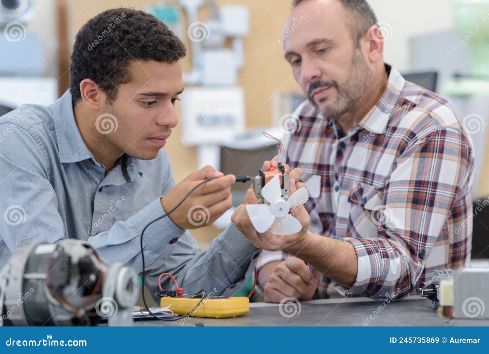 Man Fixing Electronic Circuits in Service Center Stock Image - Image of ...
