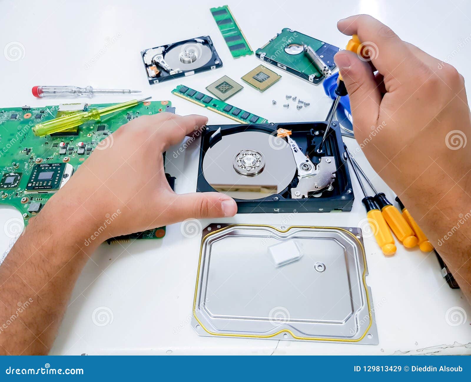 Man fixing electronics stock image. Image of equipment - 129813429