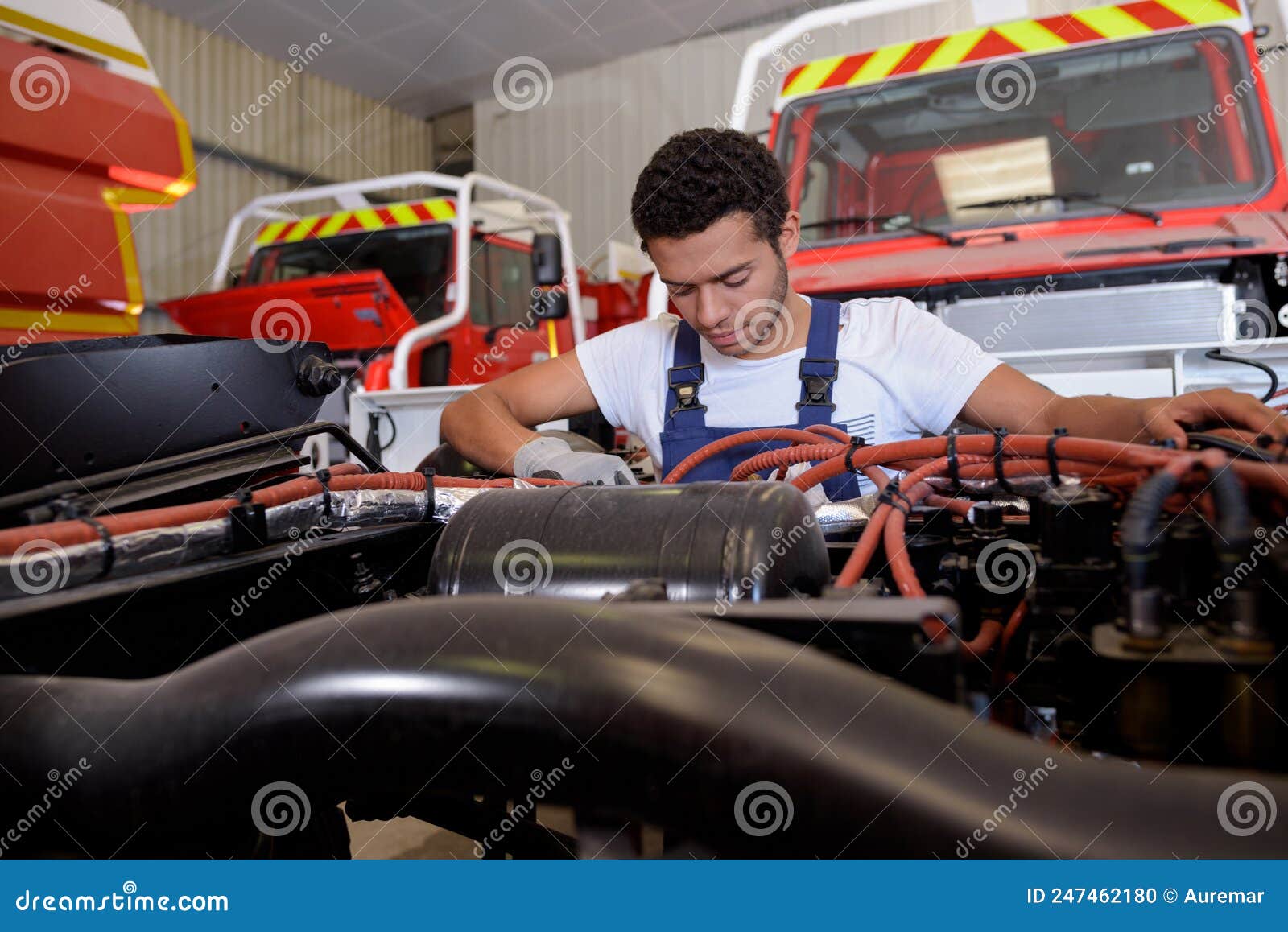 Man fixing engine stock photo. Image of worker, working - 247462180