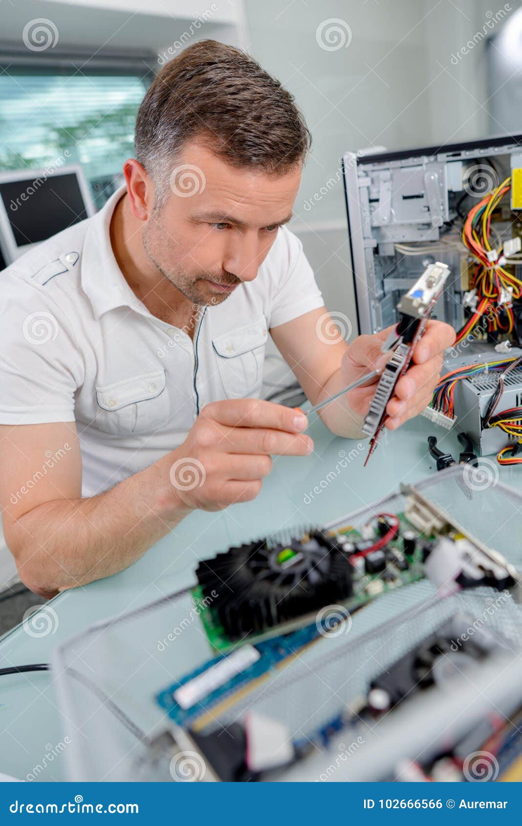 Man fixing hard drive stock photo. Image of screwdriver - 102666566