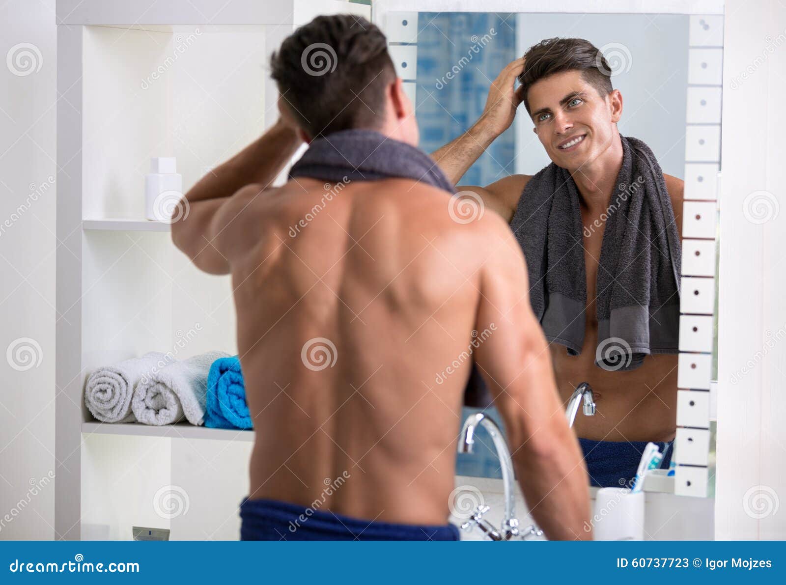 Man fixing his hair stock image. Image of handsome, brush - 60737723