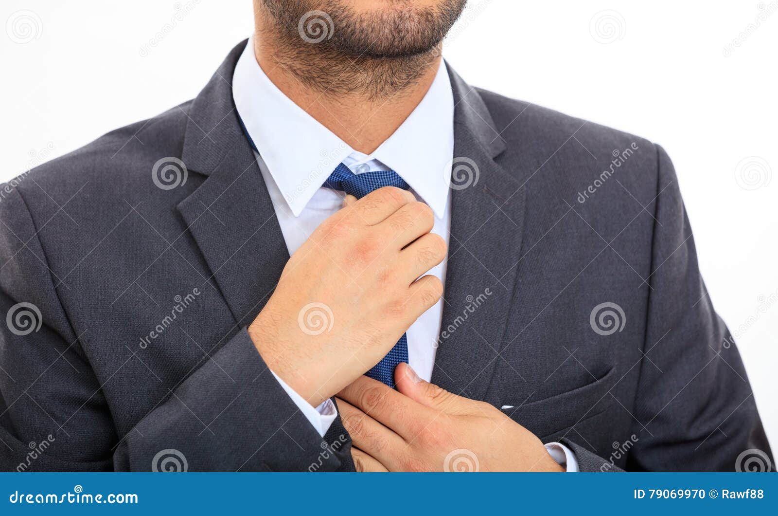 Man fixing his tie stock photo. Image of dressed, adult - 79069970