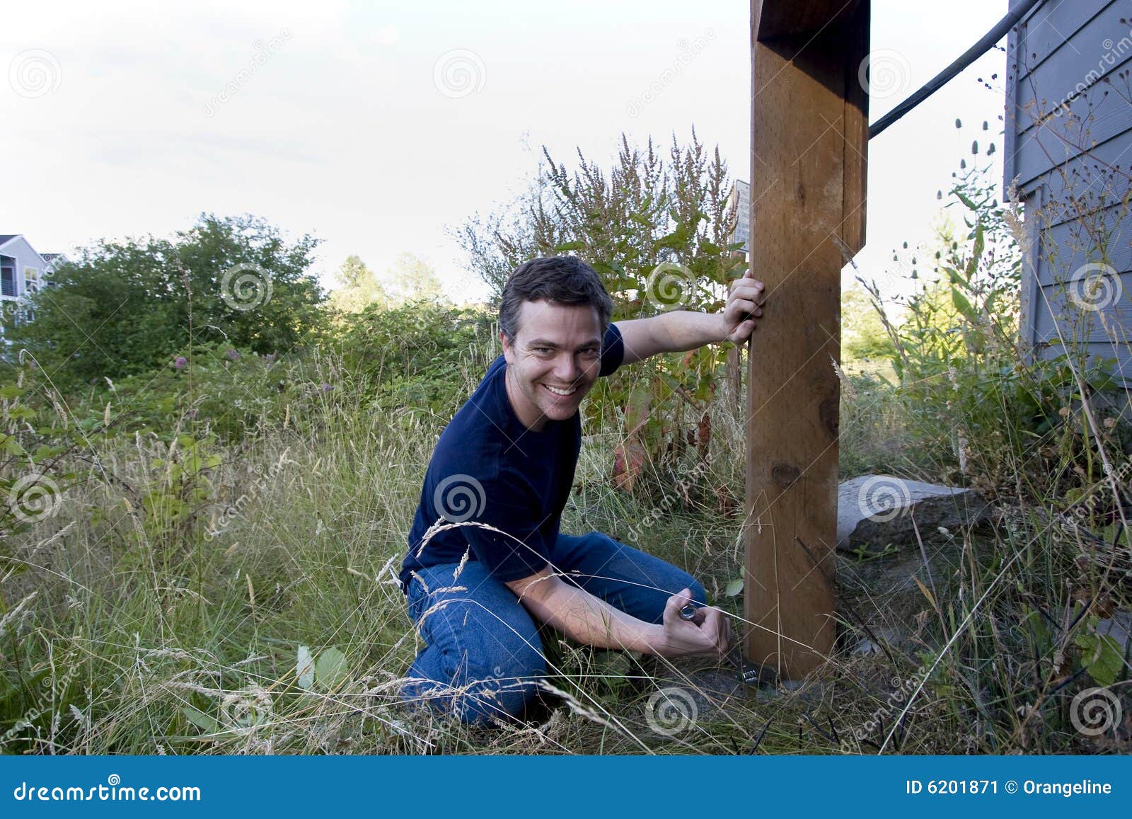 Man Fixing House - Horizontal Stock Image - Image of drill, smiling ...