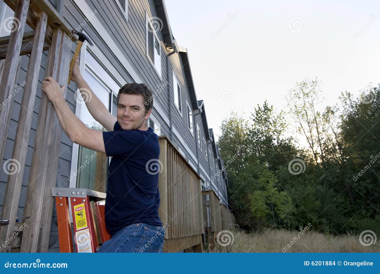 Man Fixing House - Horizontal Stock Photo - Image of adult, outside ...