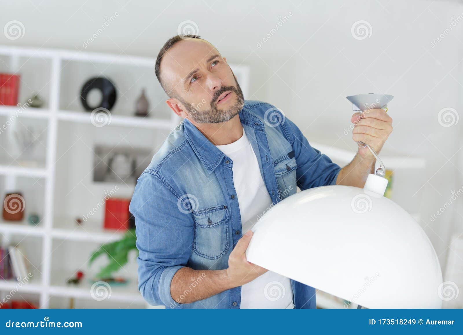 Man fixing lamps stock image. Image of craftsman, comic - 173518249