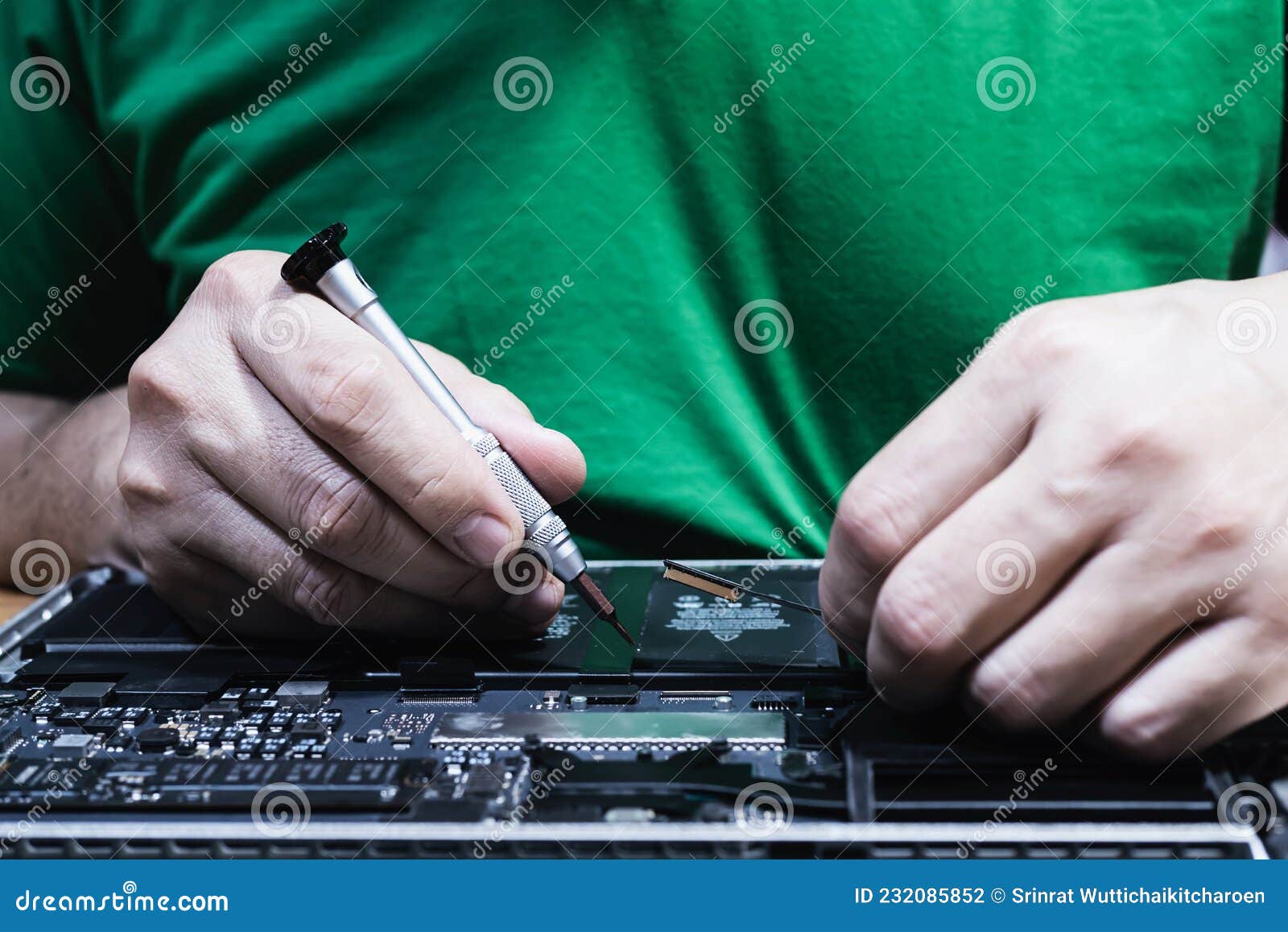 Man fixing laptop computer stock photo. Image of equipment - 232085852