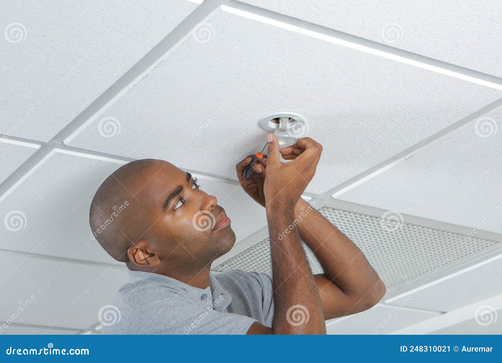 Man fixing light bulb stock image. Image of reparation - 248310021