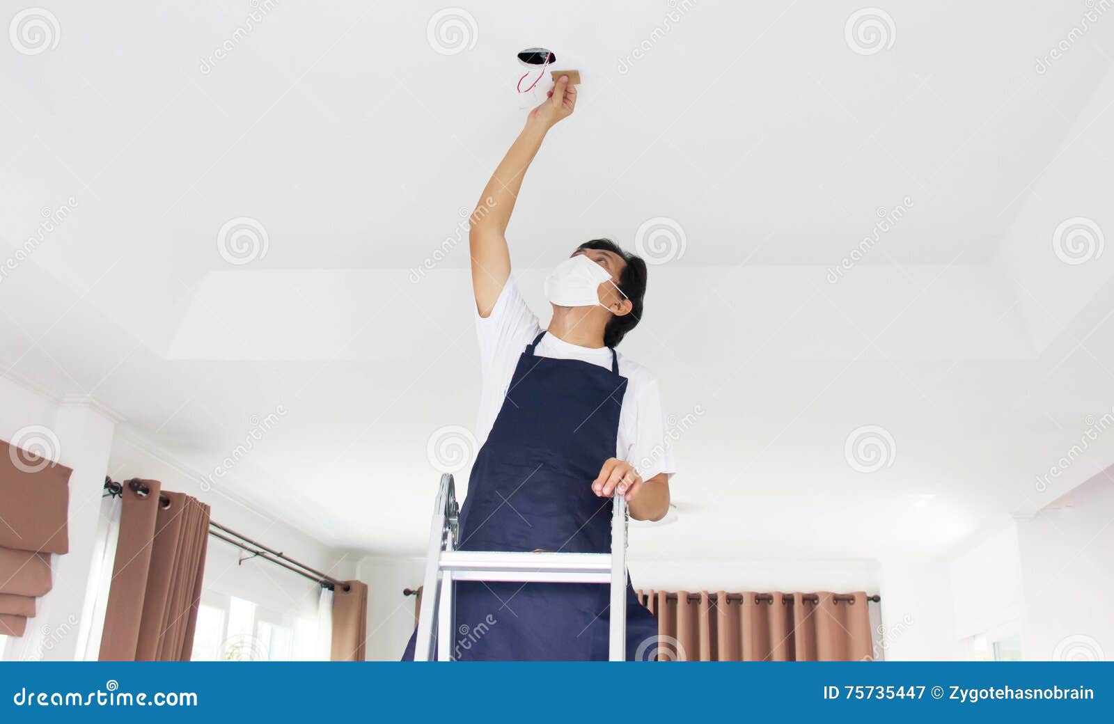 Man Fixing Light. stock image. Image of fixture, skill - 75735447