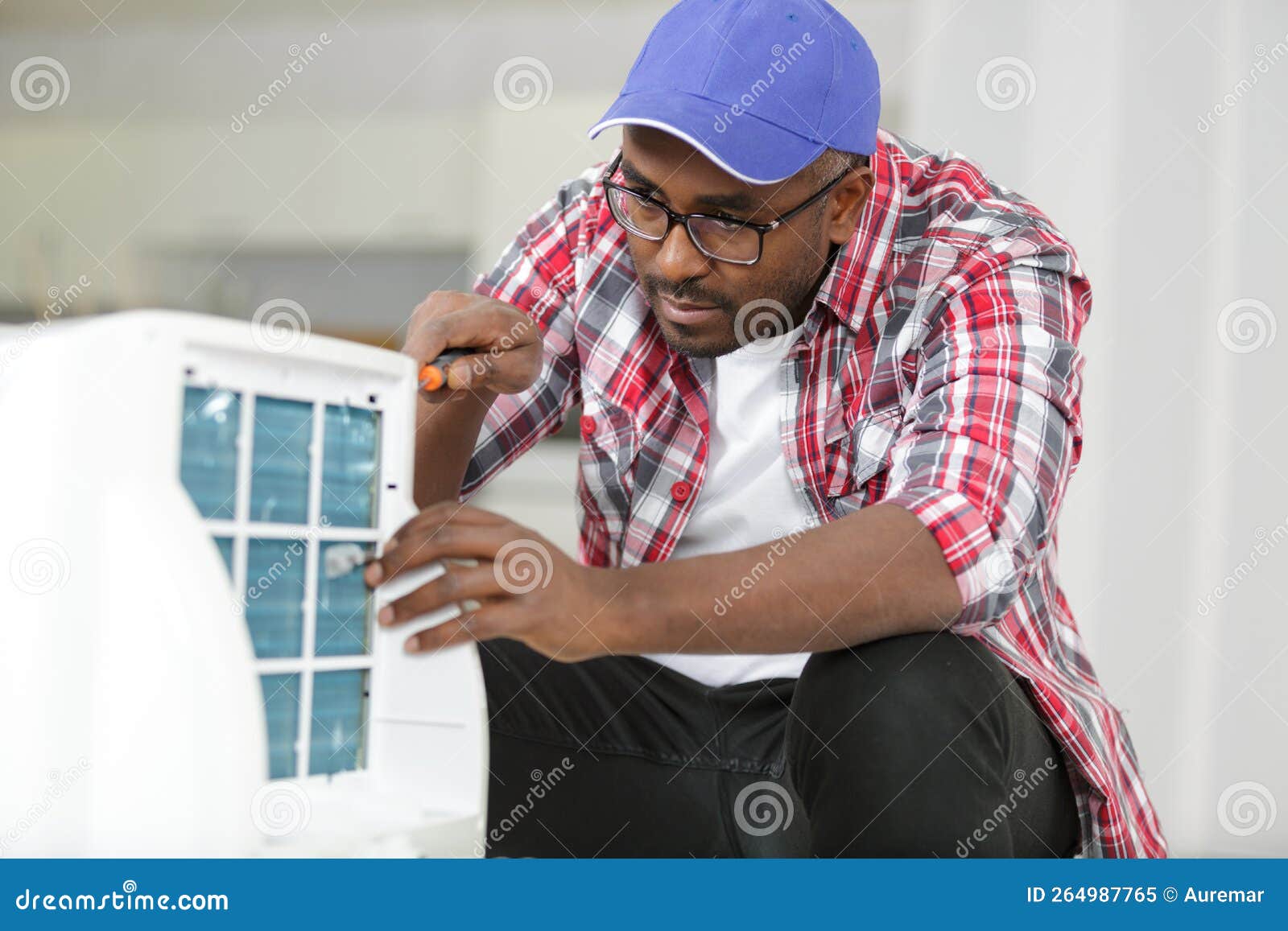 Man Fixing and Maintaining Air Conditioning System Stock Image - Image ...