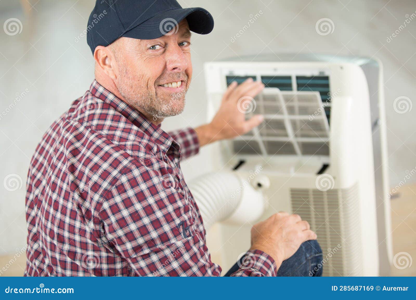 Man Fixing and Maintaining Air Conditioning System Stock Image - Image ...