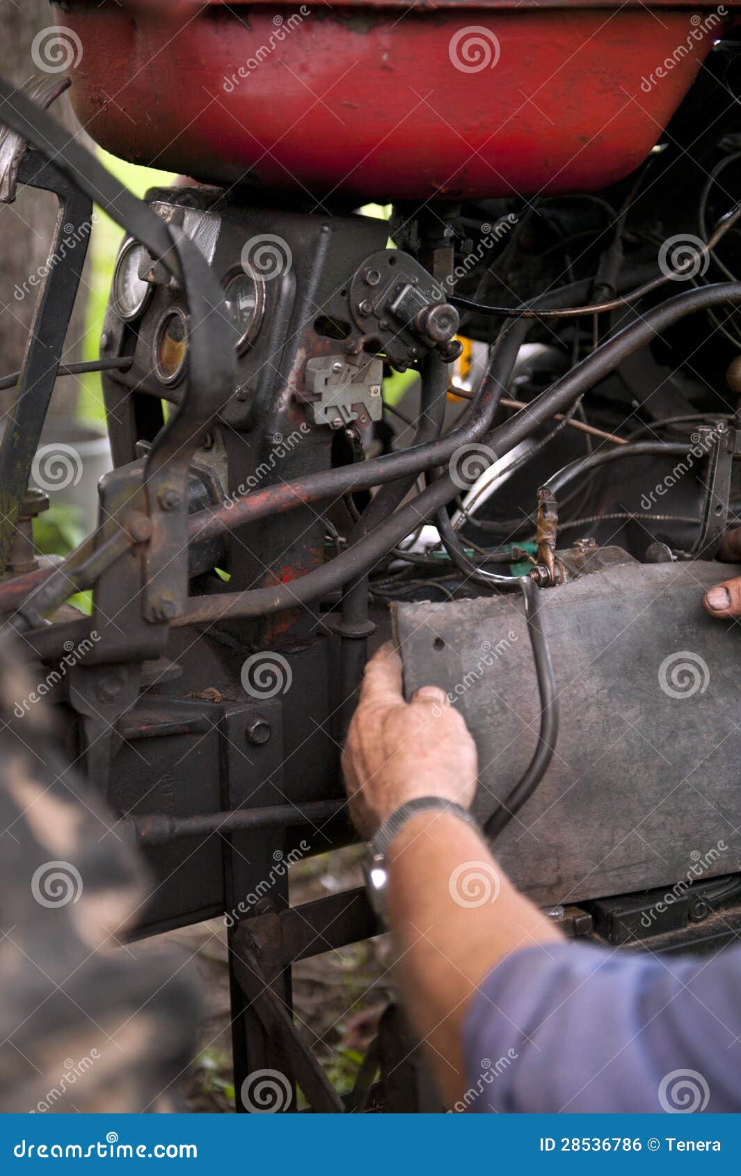 Man fixing old tractor stock photo. Image of automobile - 28536786 Man fixing old tractor stock photo. Image of automobile - 28536786