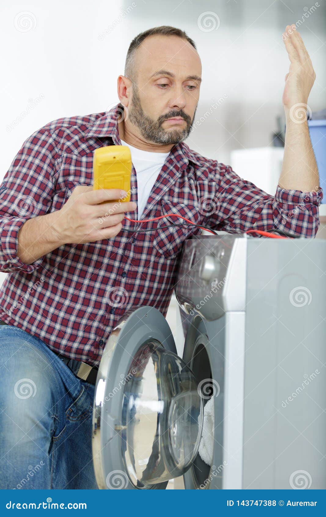 Man Fixing Problem on Clothes Washer Stock Photo - Image of repairman ...
