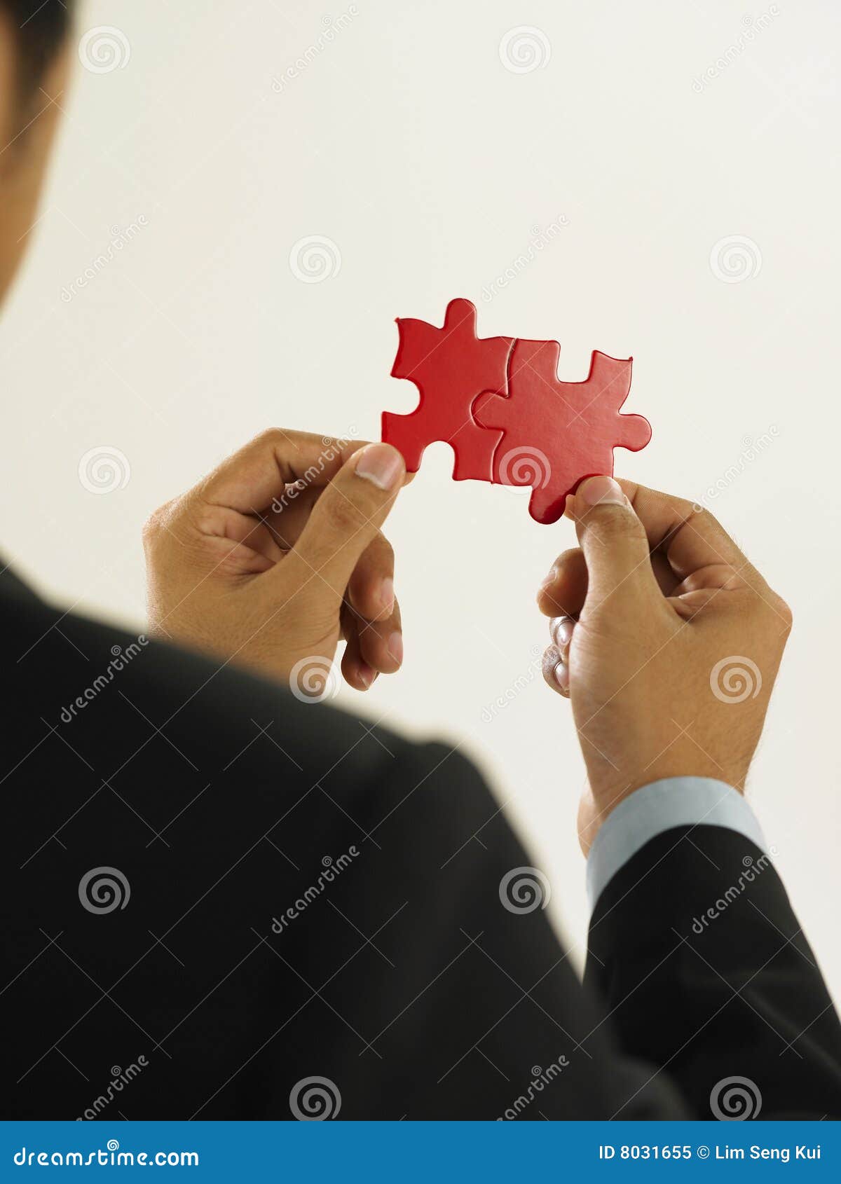 Man Fixing the Red Color Puzzle Stock Image - Image of solving ...