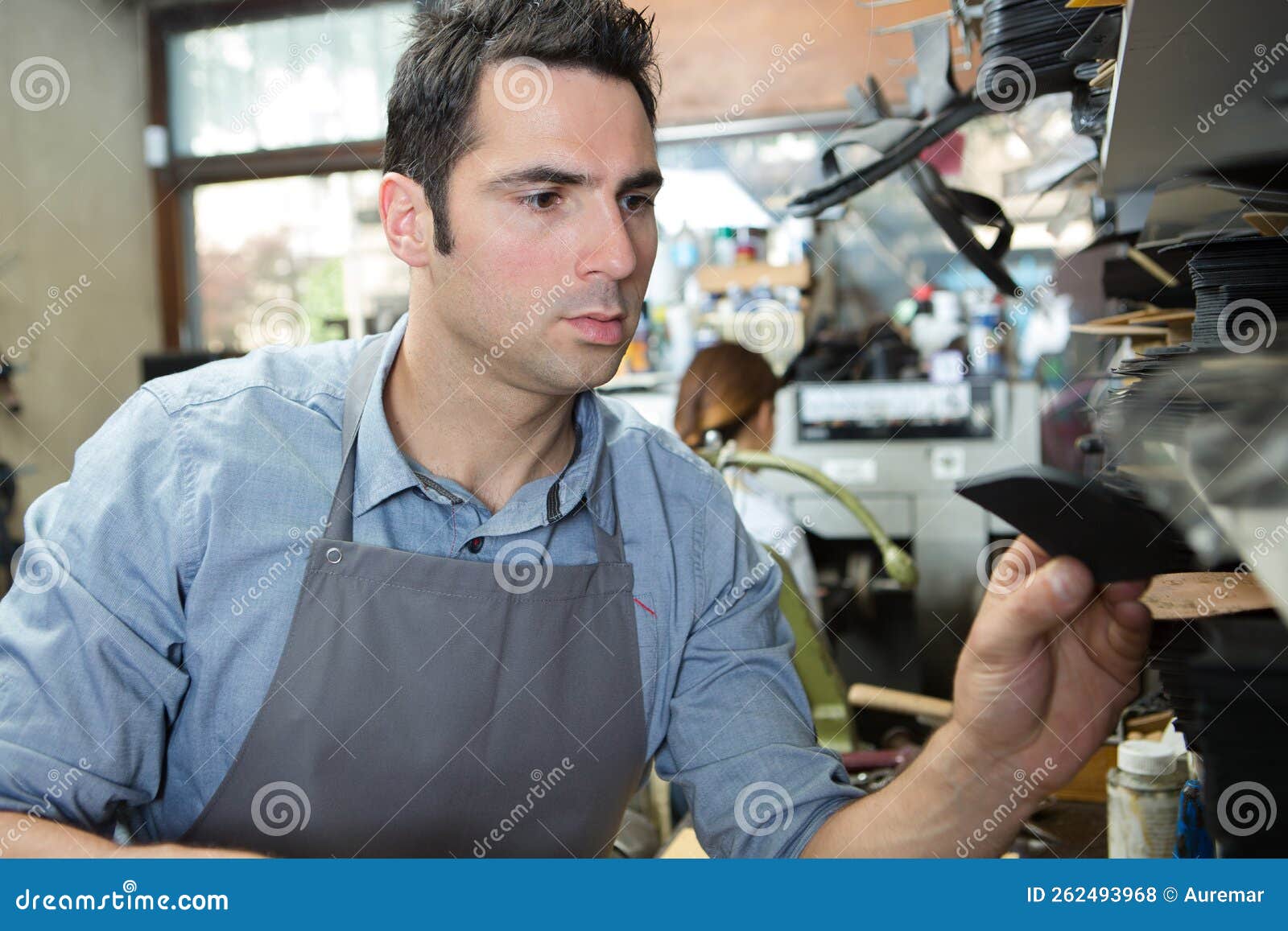 Man fixing shoes stock photo. Image of craft, shoes - 262493968