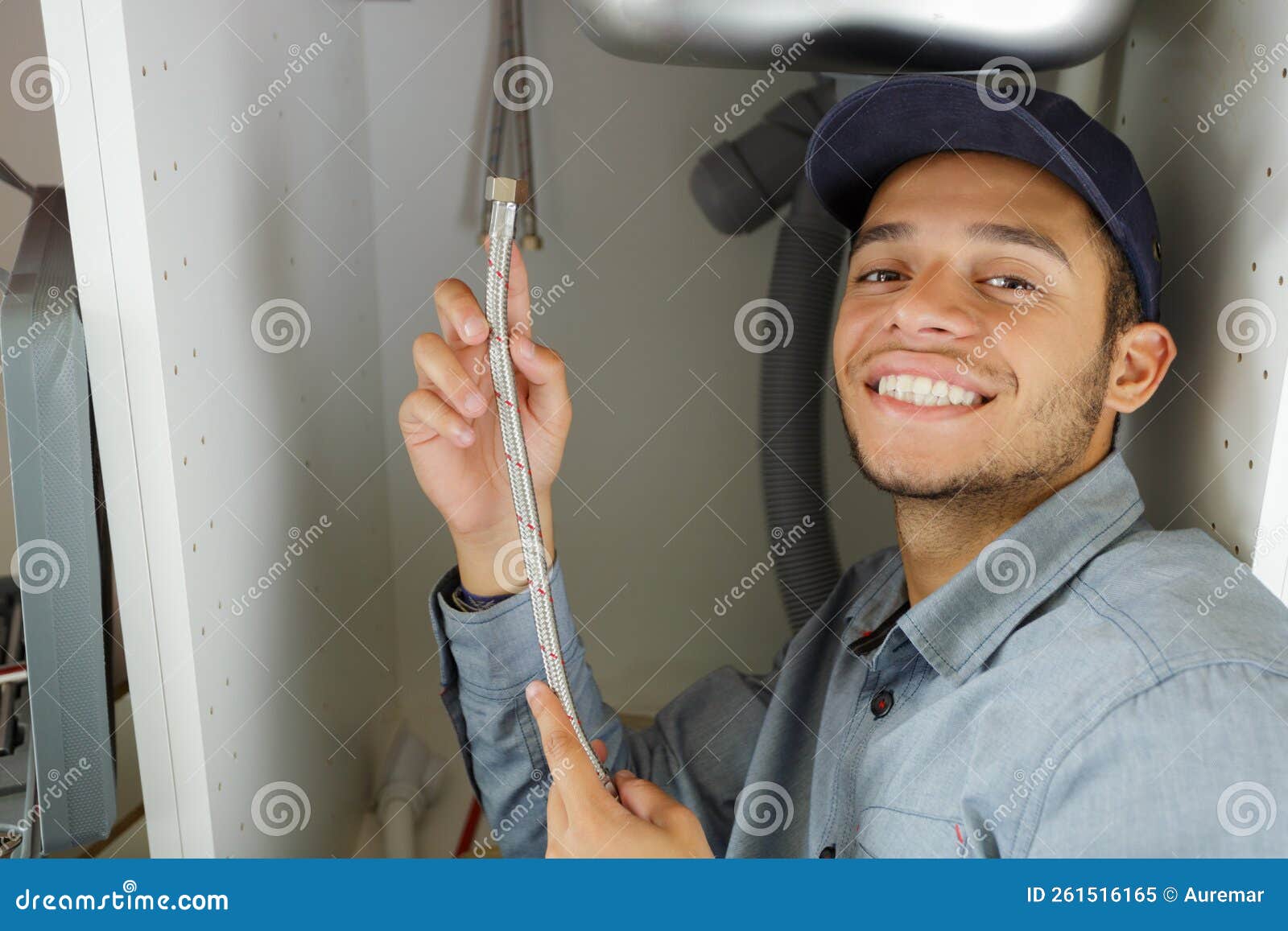 Man Fixing Sink Pipe in Kitchen Stock Image - Image of domesticlife ...