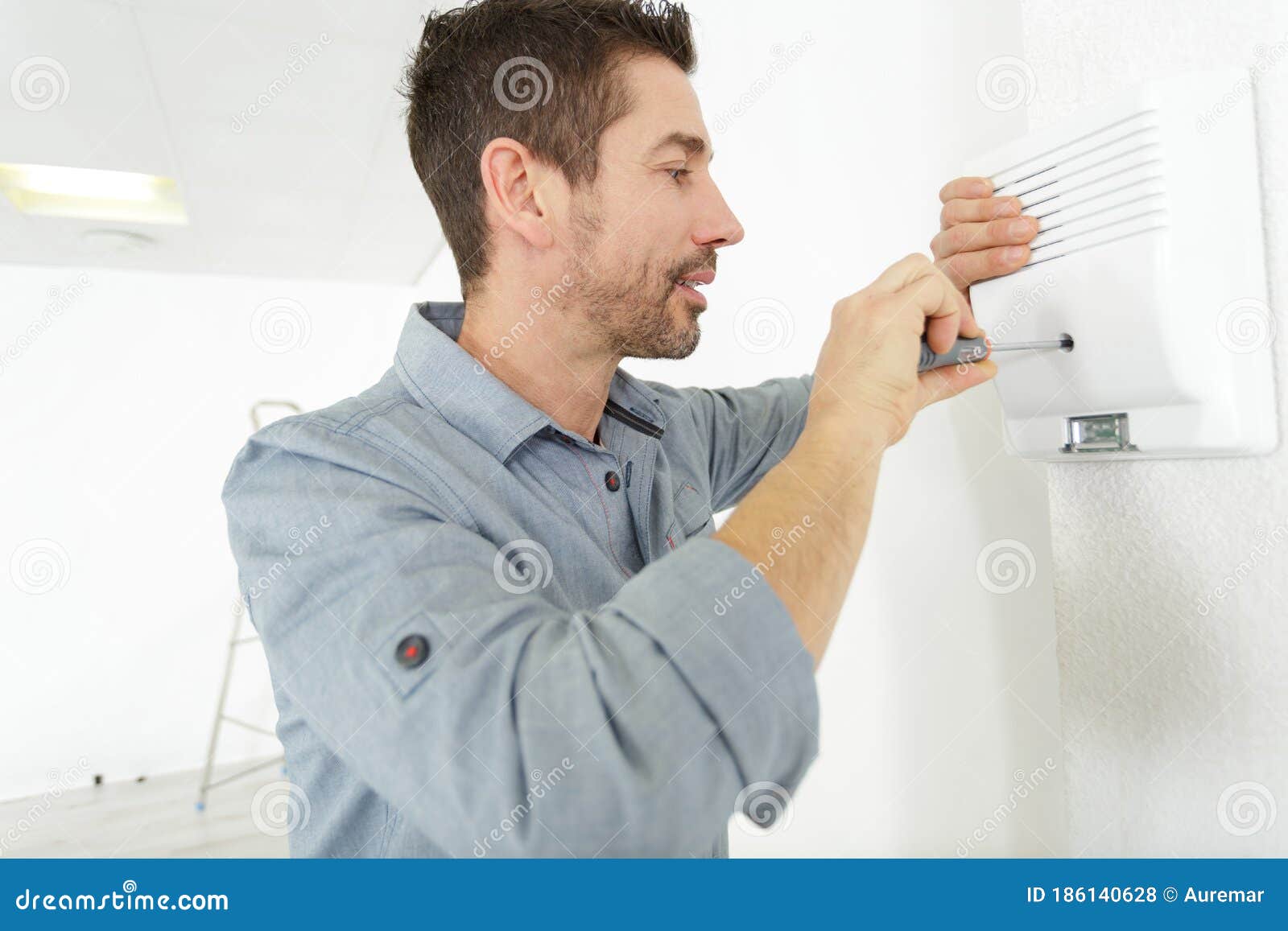 Man Fixing Technical Problem at Home Stock Photo - Image of people ...