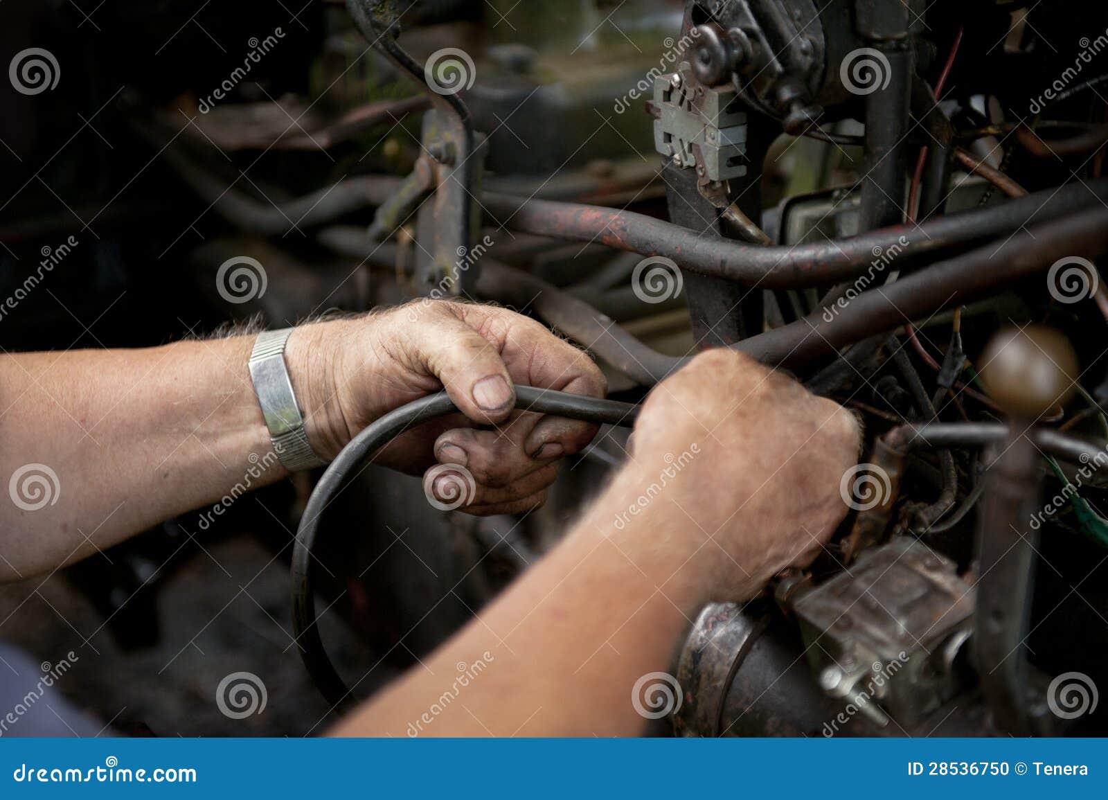 Man Fixing Old Tractor Stock Photo | CartoonDealer.com #28536786 Man Fixing Old Tractor Stock Photo | CartoonDealer.com #28536786