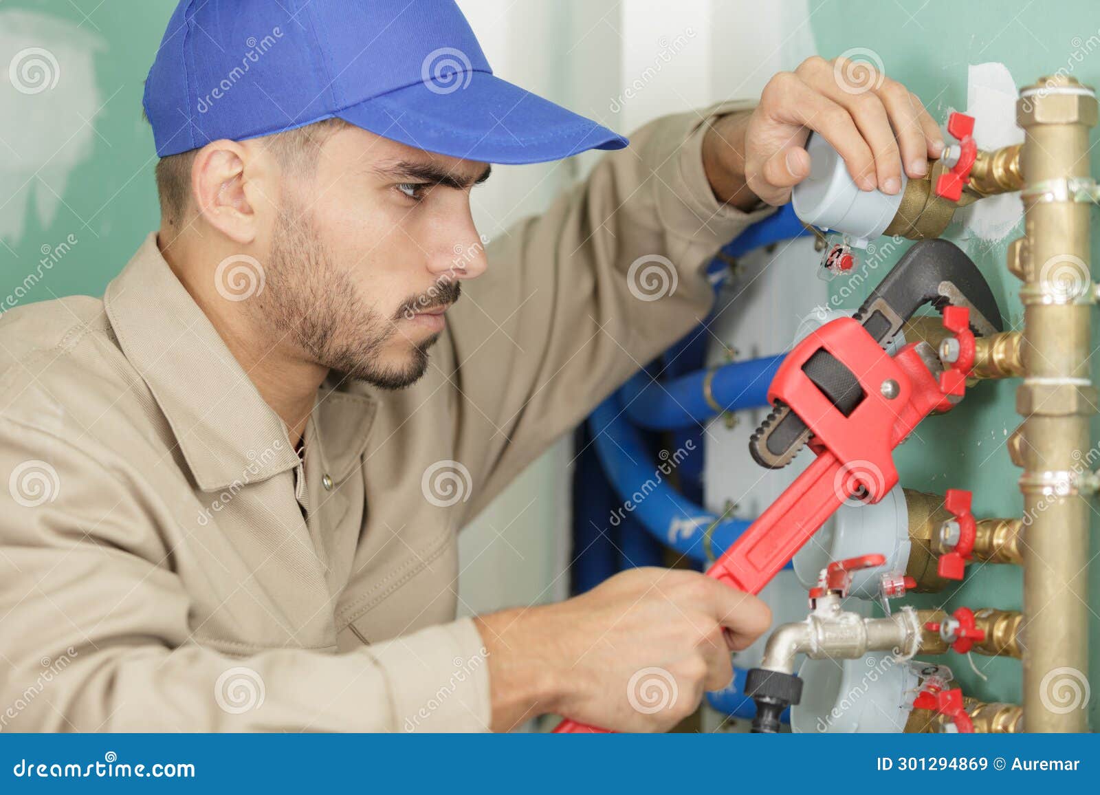 Man fixing water meter stock image. Image of pipes, technology - 301294869