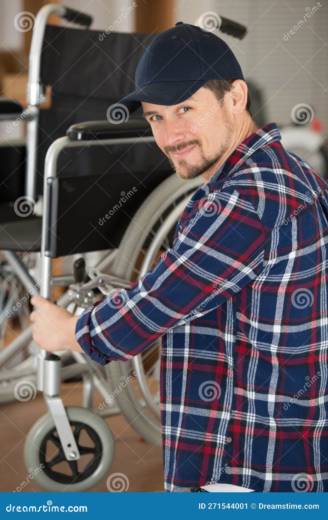 Man fixing wheelchair stock image. Image of wood, wheelchair - 271544001