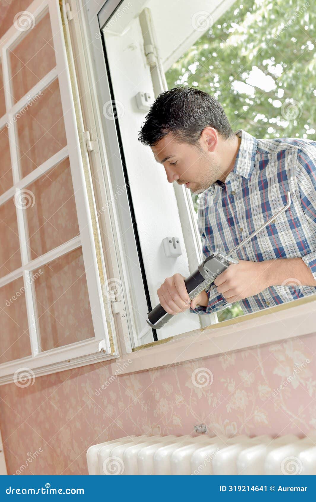 Man fixing window stock image. Image of young, assistance - 319214641