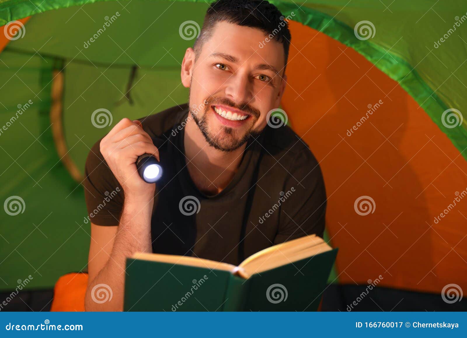 Man with Flashlight Reading Book Stock Image - Image of activity, read ...