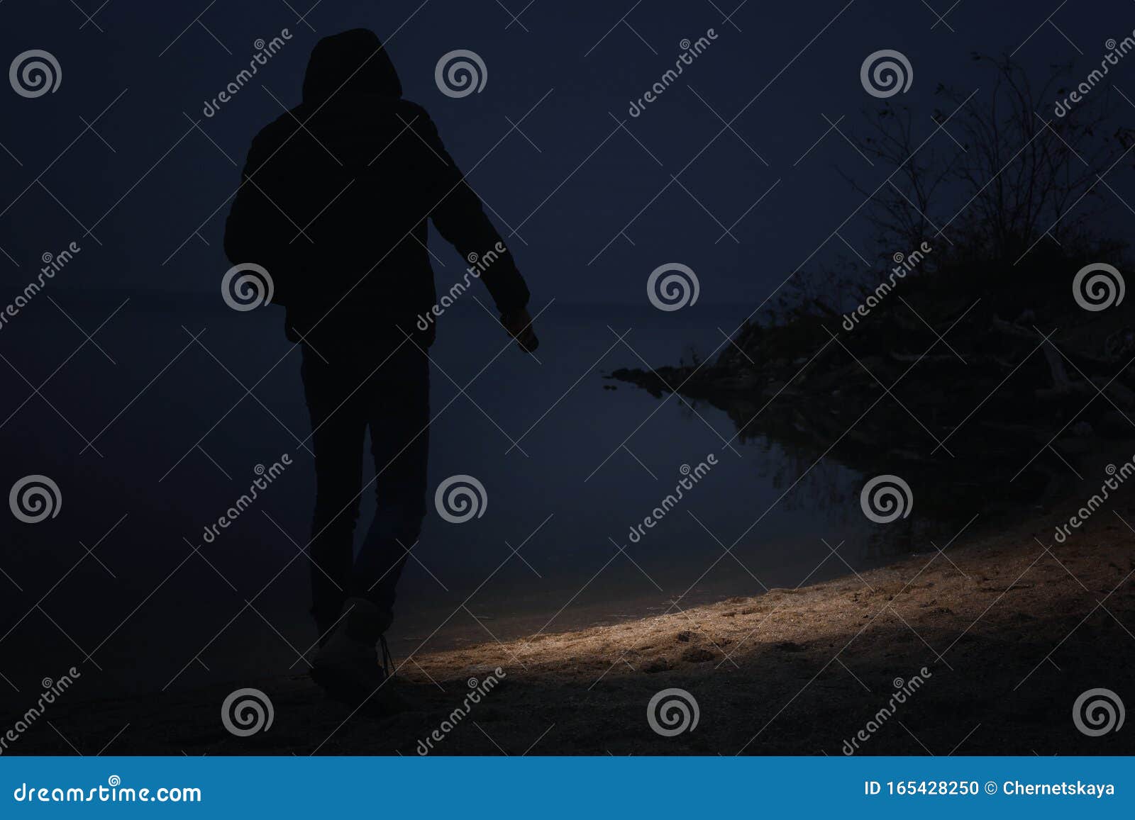 Man with Flashlight Walking Near River Stock Photo - Image of hiking ...