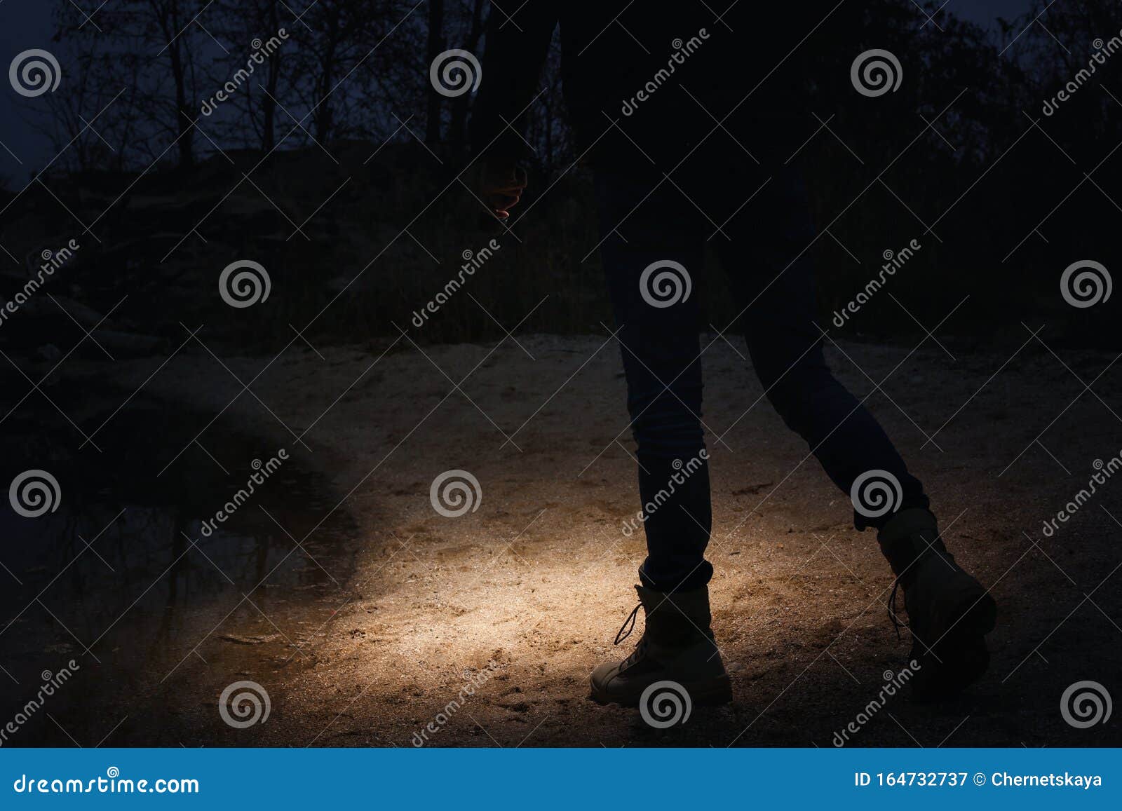Man with Flashlight Walking at Riverside Stock Image - Image of bright ...