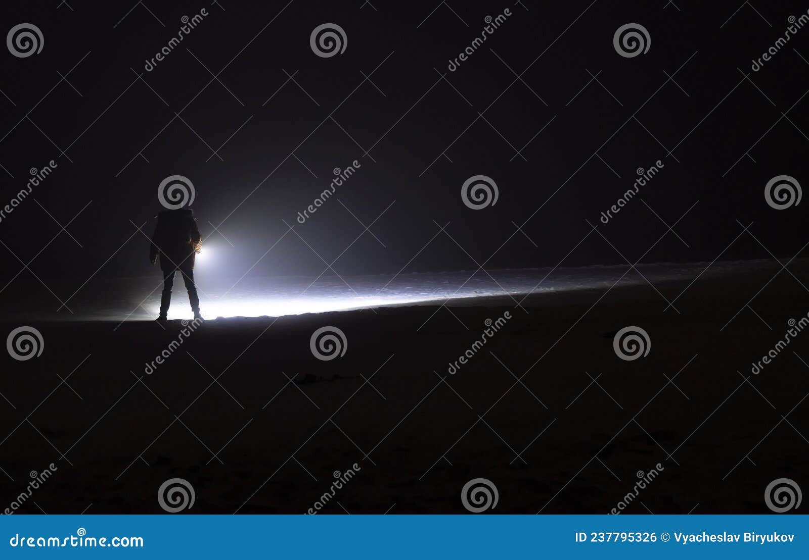 Man with Flashlight in Winter Night Stock Photo - Image of mysterious ...