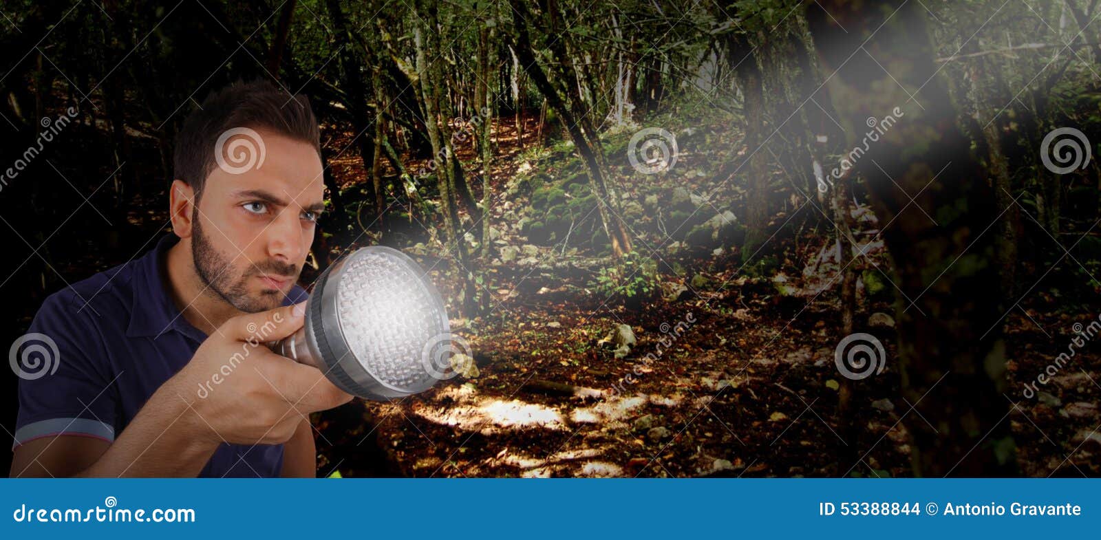 Man with a Flashlight in the Woods. Stock Photo - Image of black, face ...