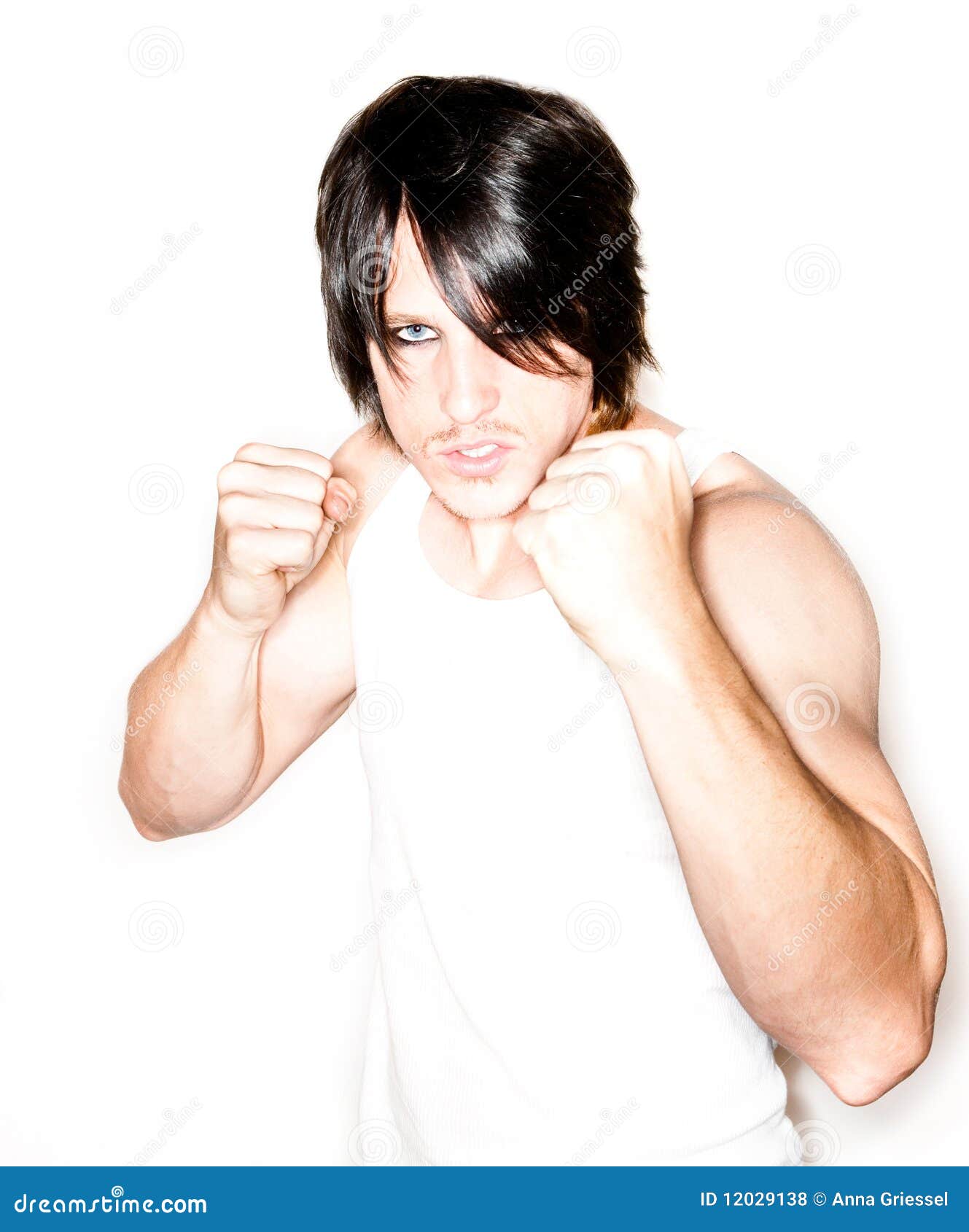 Man Flexing His Biceps and Making a Face Stock Photo - Image of angry ...
