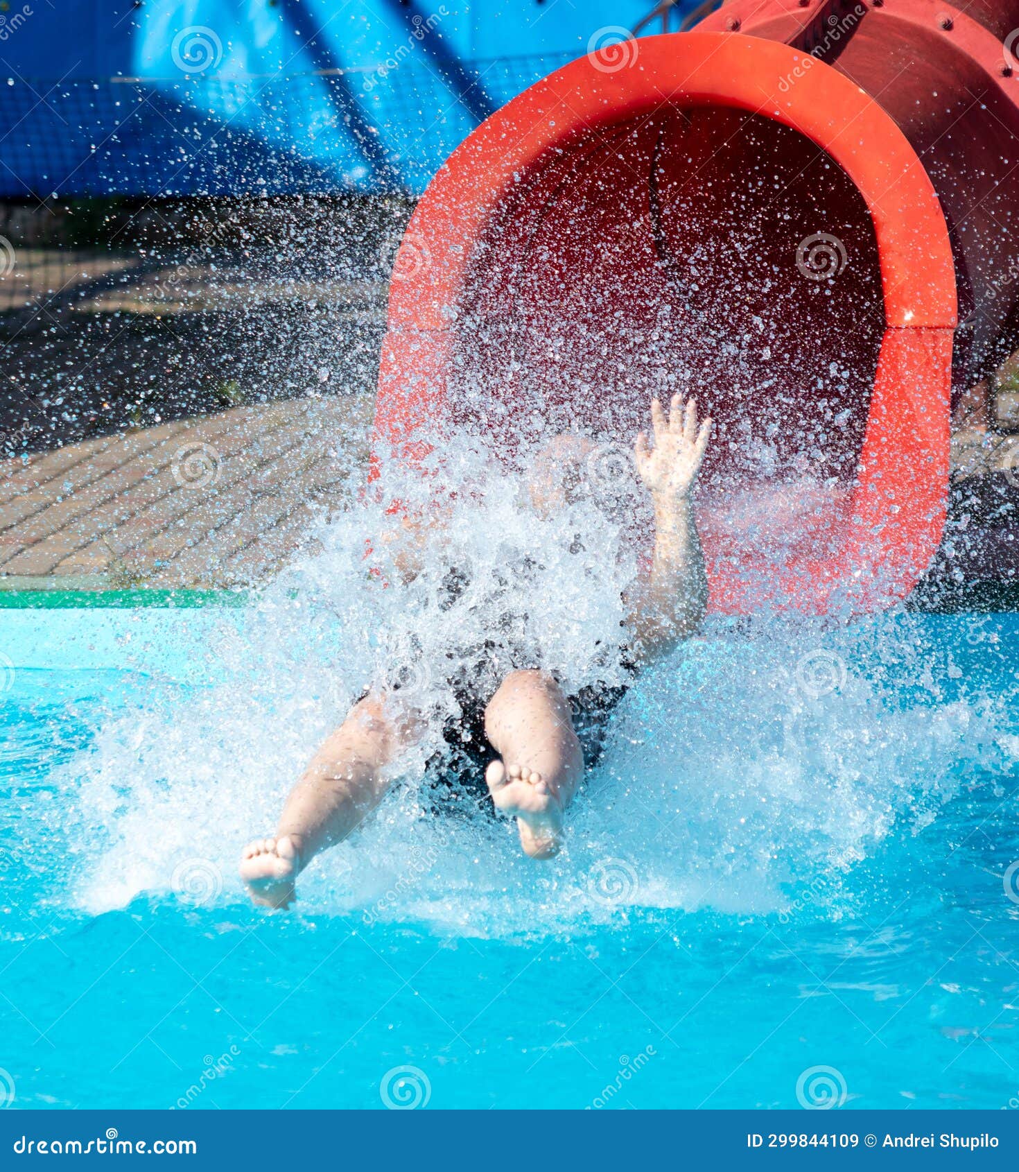 A Man Flies from a Slide into a Swimming Pool Stock Image - Image of ...