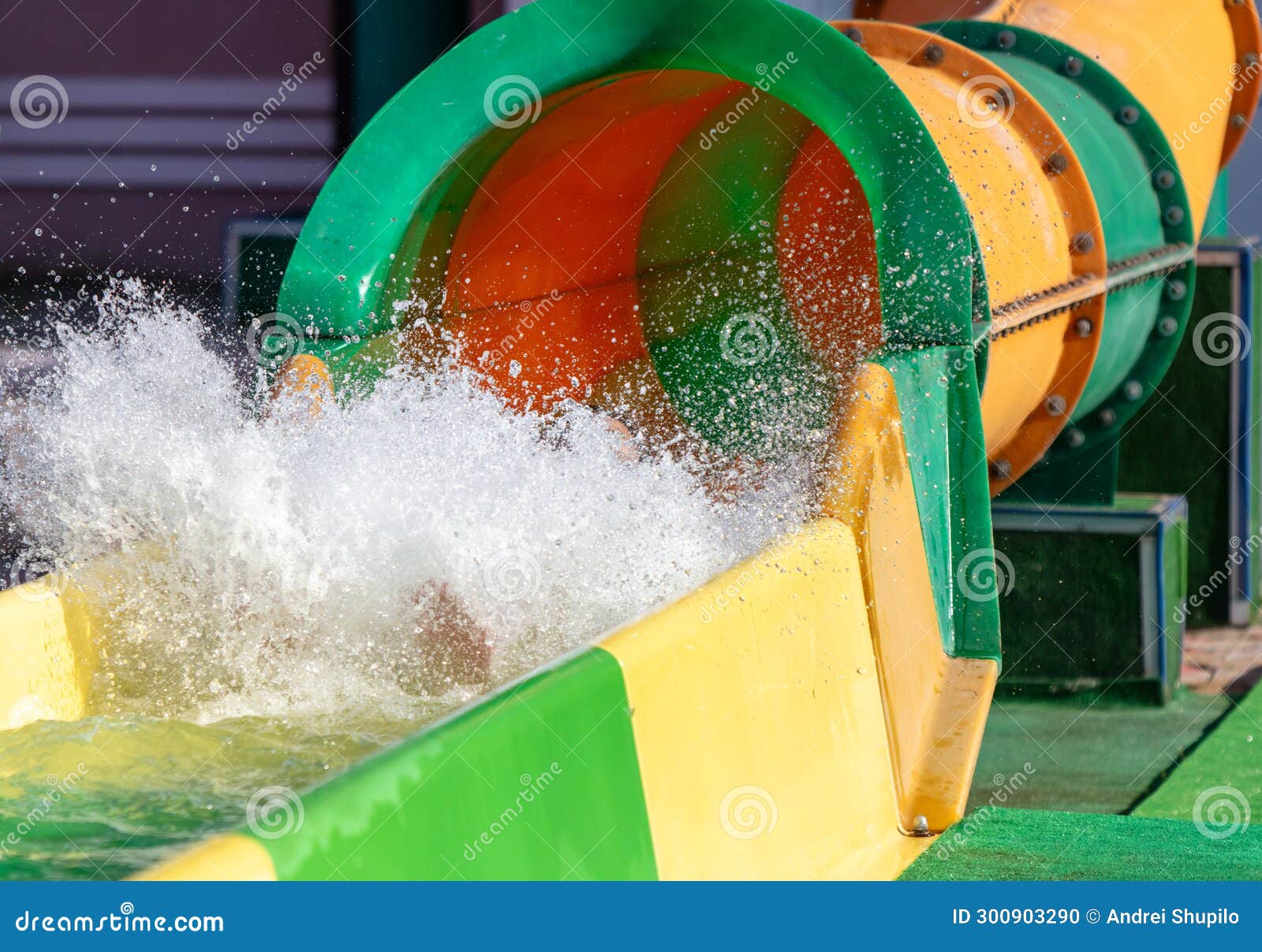 A Man Flies from a Slide into a Swimming Pool Stock Photo - Image of ...