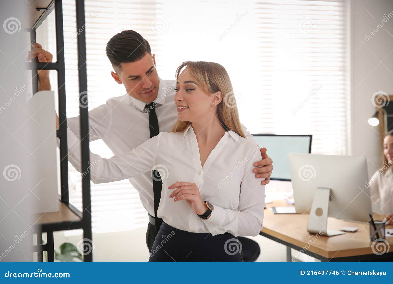 Man Flirting with His Colleague in Office Stock Photo - Image of ...