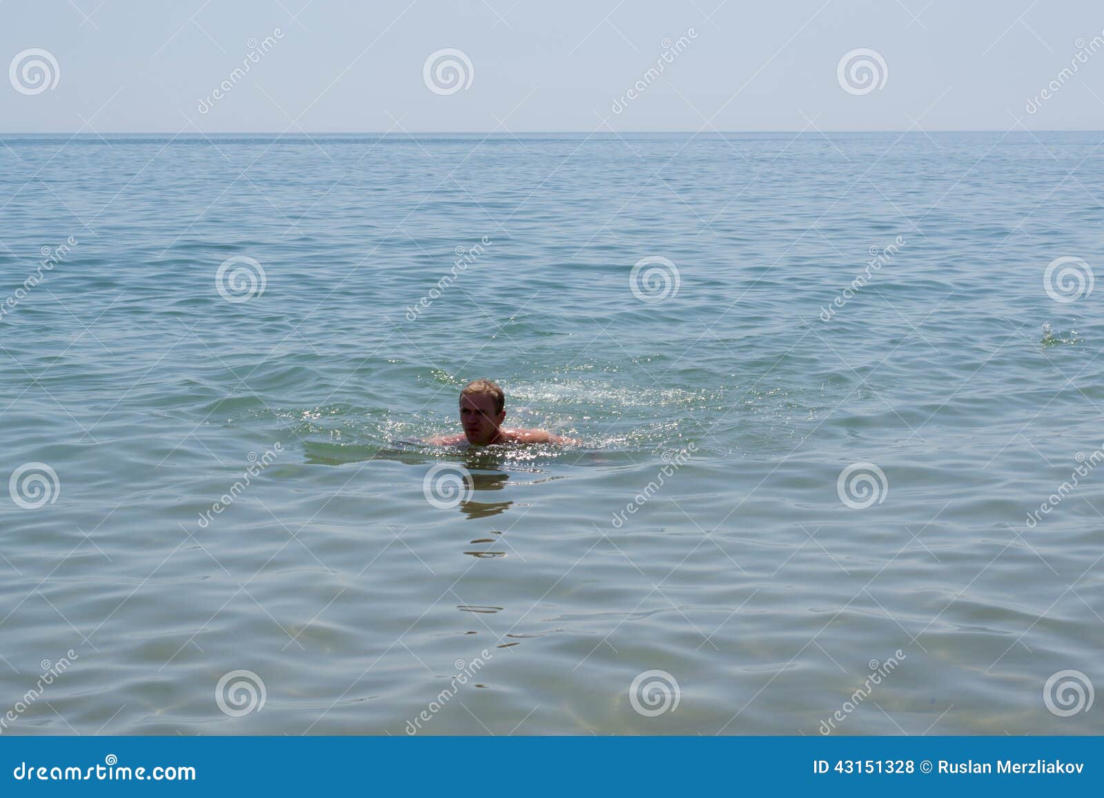 Man floating in the sea stock photo. Image of event, professional ...