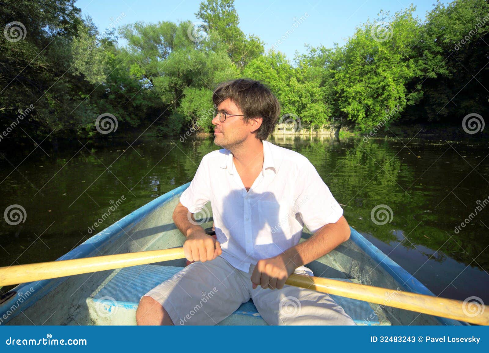 Man Floats Down the River on a Boat Stock Image - Image of river ...
