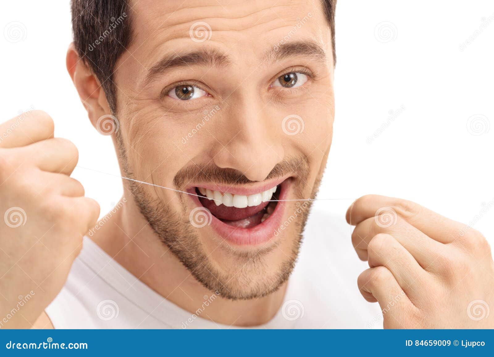 Man flossing his teeth stock image. Image of flossing - 84659009