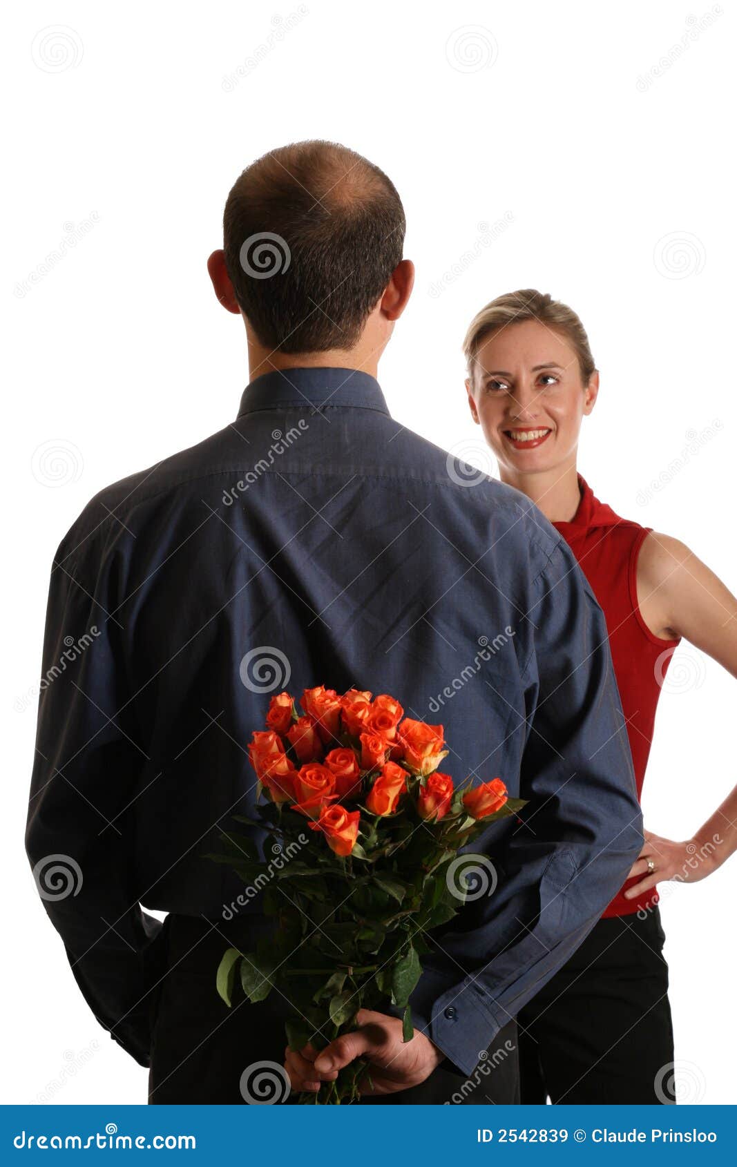Man with Flowers Behind Back Stock Image - Image of back, woman: 2542839