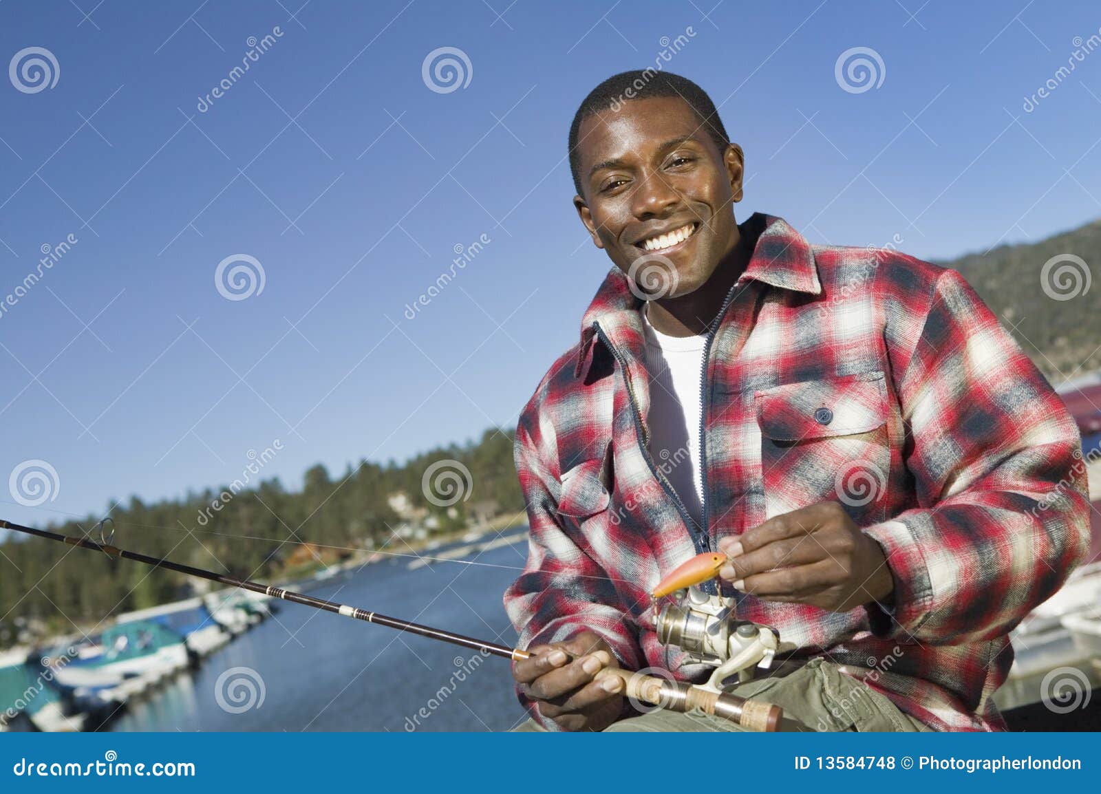 Man fly fishing on lake stock photo. Image of hobbies - 13584748