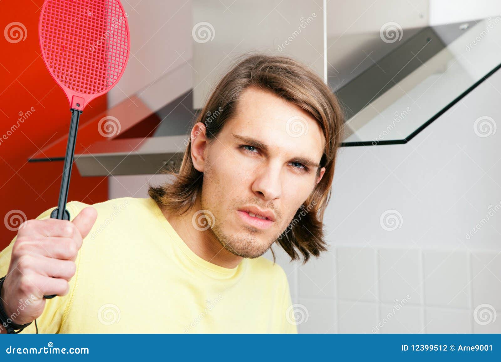 Man with a fly swat stock photo. Image of person, appartment - 12399512