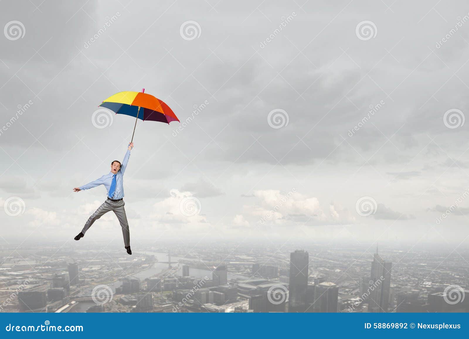 Man fly on umbrella stock photo. Image of achievement - 58869892