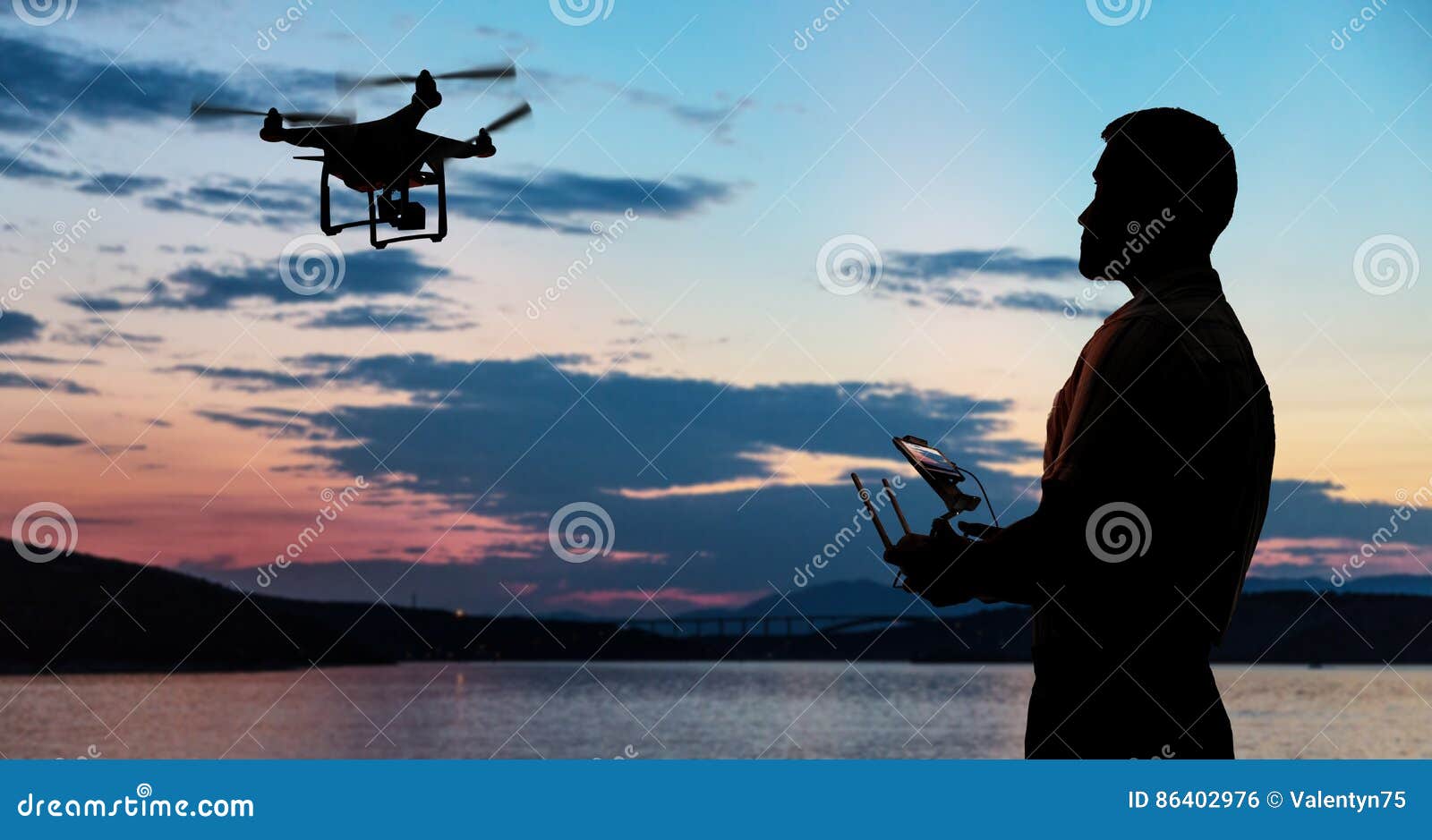 Man flying a drone. stock photo. Image of sundown, propeller - 86402976