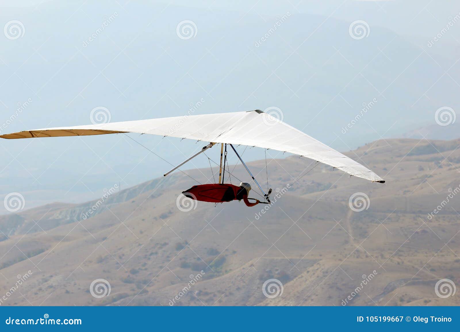 Man Flying on a Hang Glider Stock Image - Image of adrenaline, leisure ...