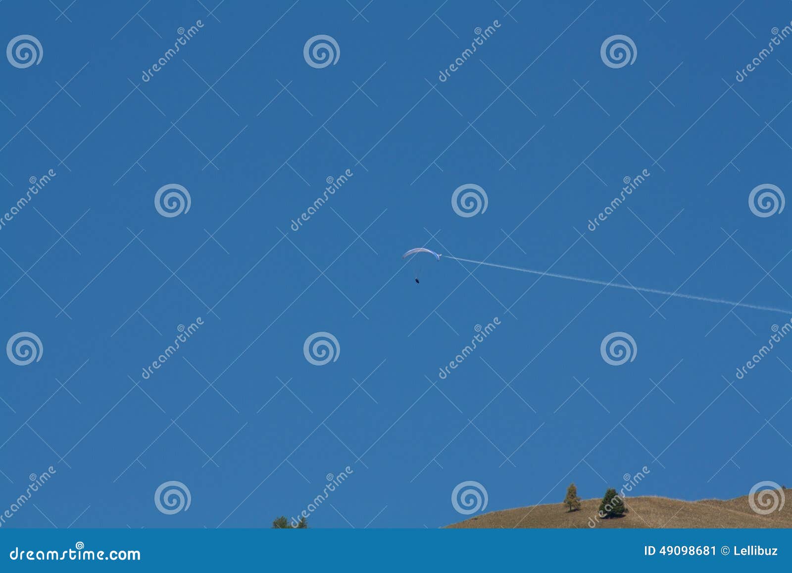 Man flying I stock image. Image of wake, nature, paragliding - 49098681