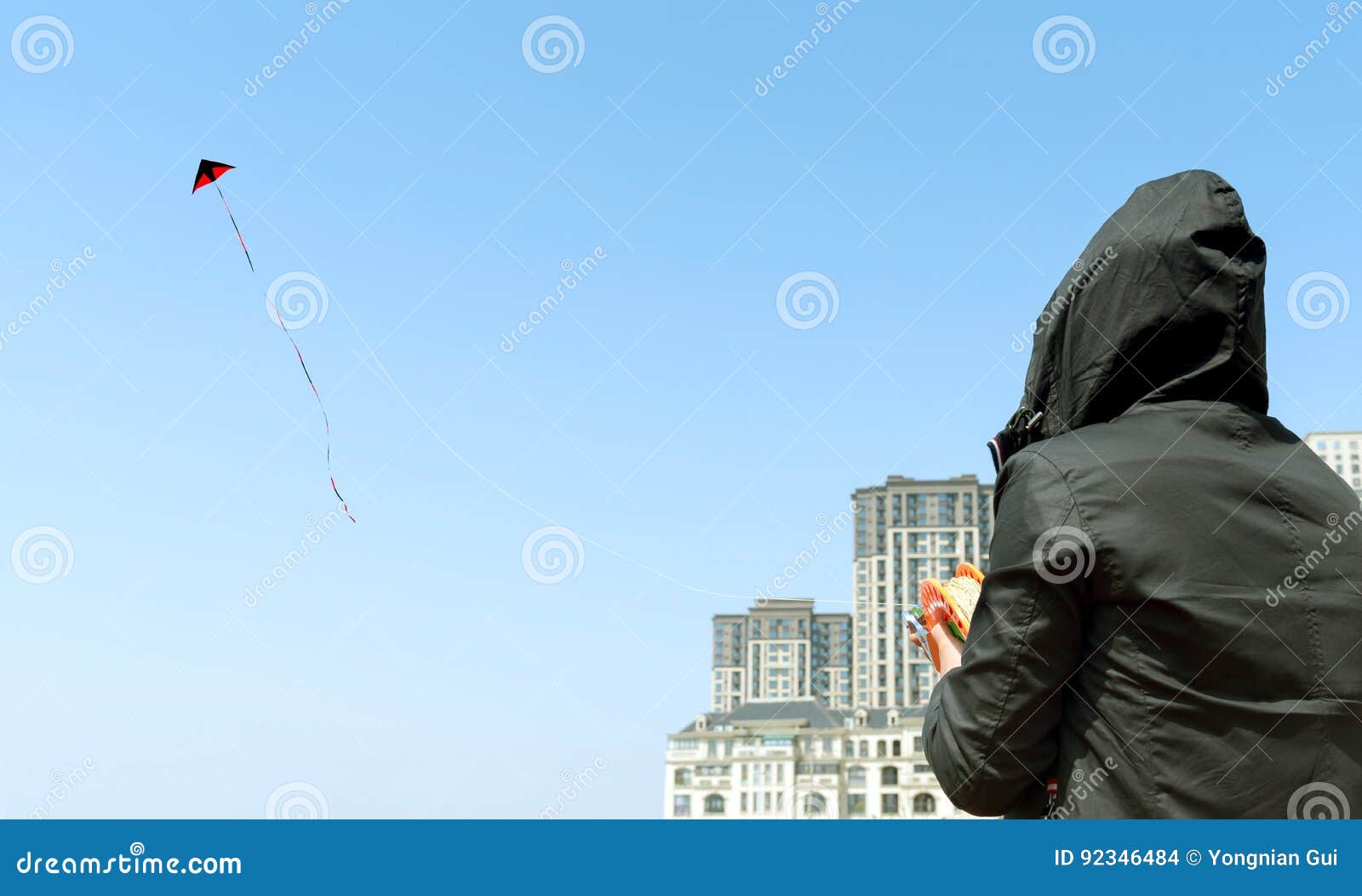 Man flying kite stock photo. Image of wind, play, look - 92346484