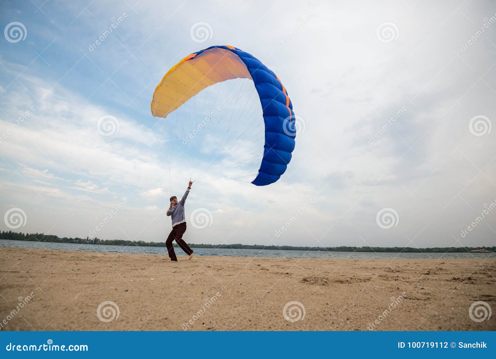 Man, with Focused Face, Control a Kite, Paraglider Stock Photo - Image ...