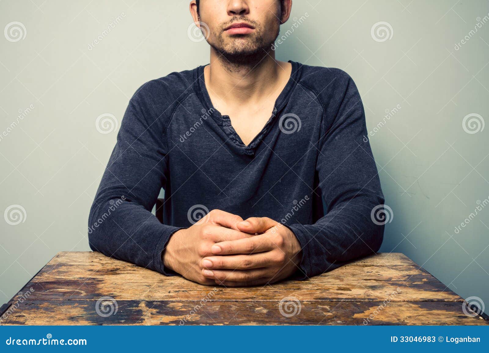 Man with Folded Hands Sitting at Desk Stock Image - Image of oriental ...